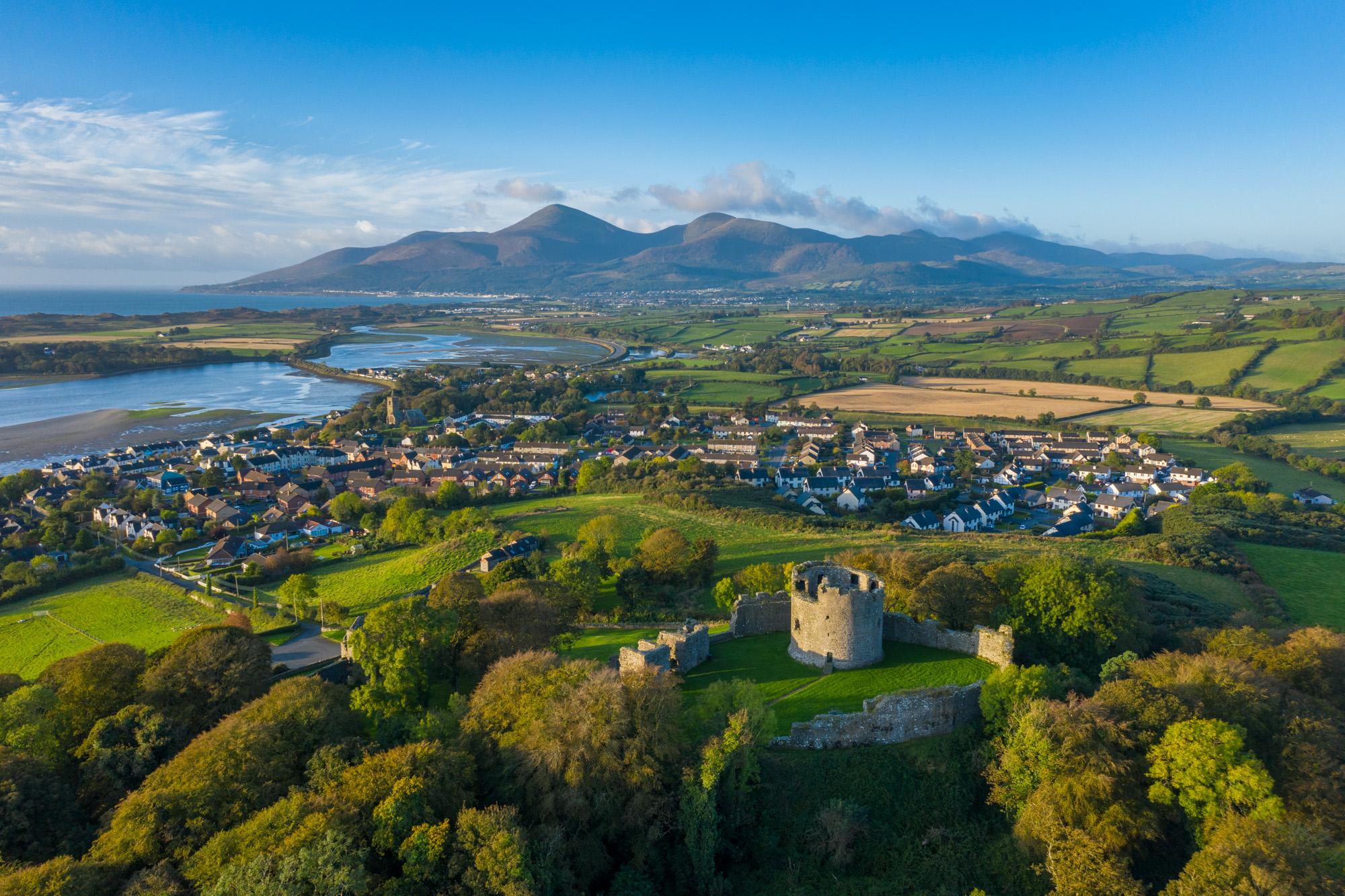 Aerial view of Dundrum castle and Dundrum Village, County Down ...